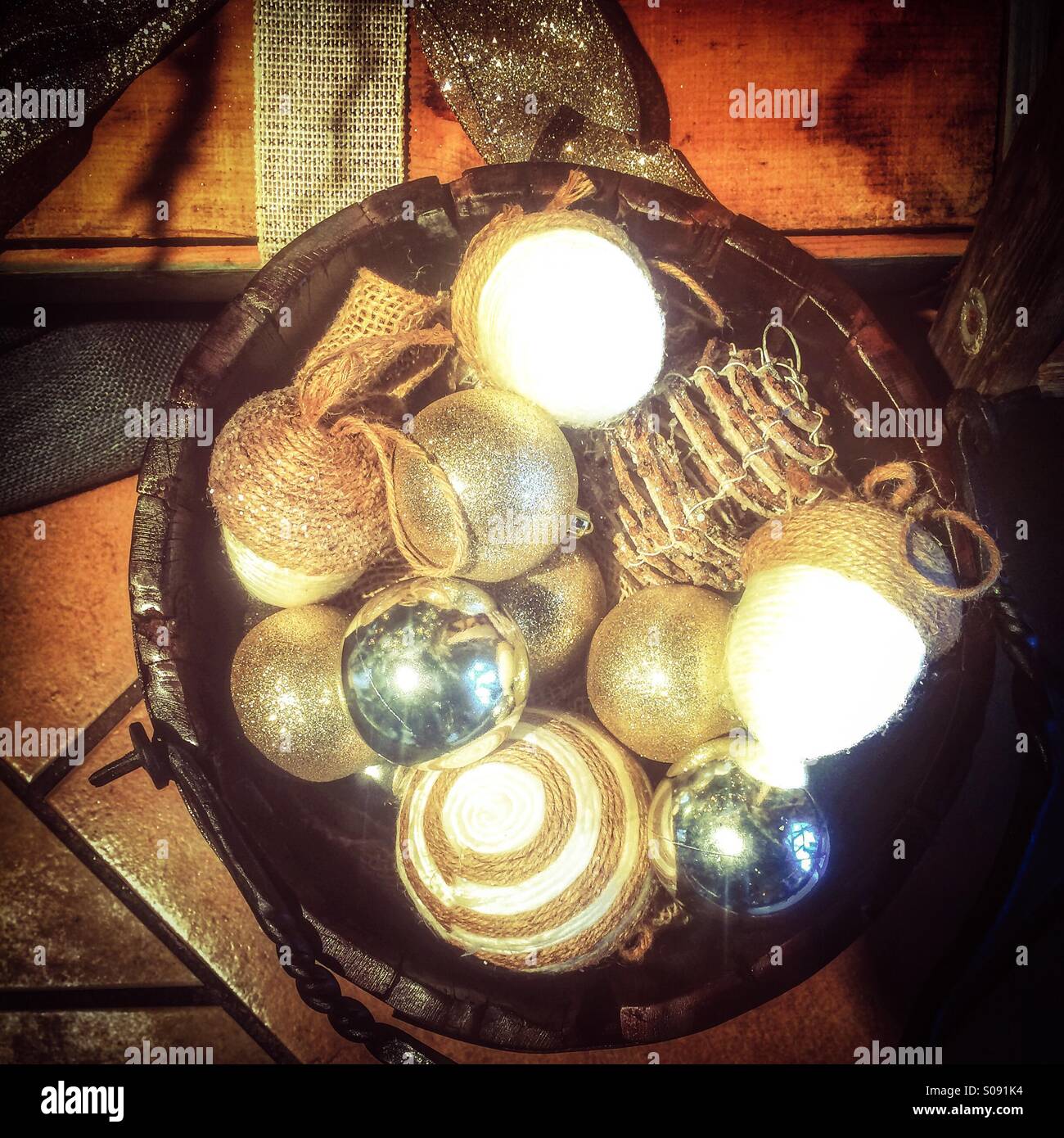 Bucket full of Christmas tree baubles Stock Photo - Alamy