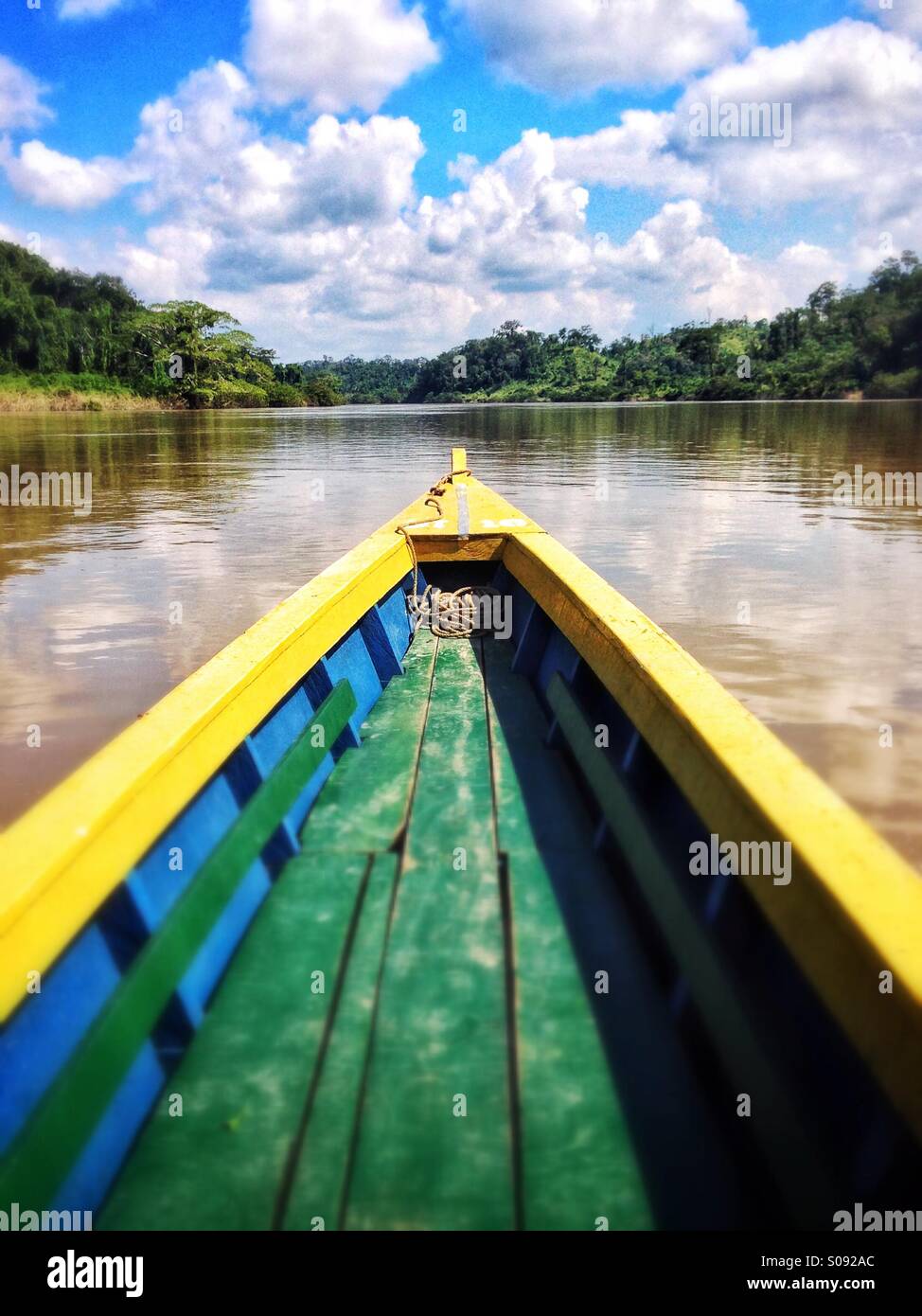 Boat on a river Stock Photo - Alamy