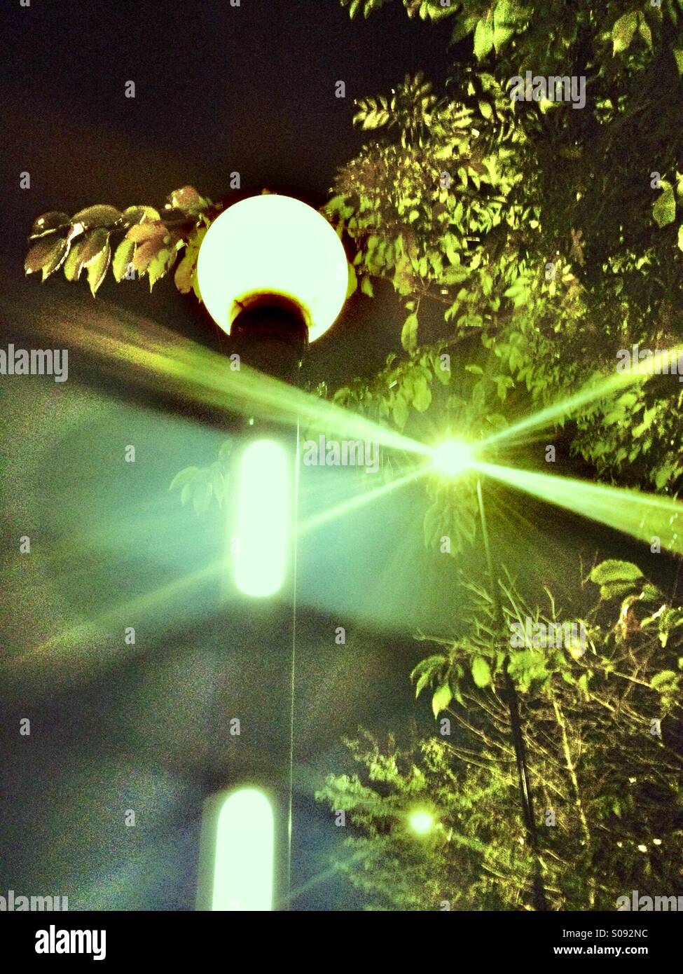 Belisha beacon and street light emitting a starburst effect Stock Photo ...