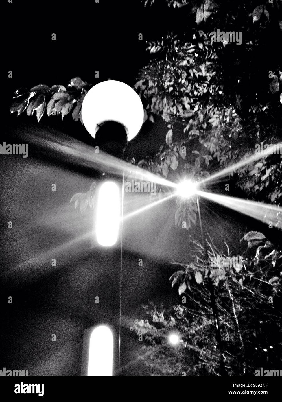 Belisha beacon and street light emitting a starburst effect Stock Photo ...