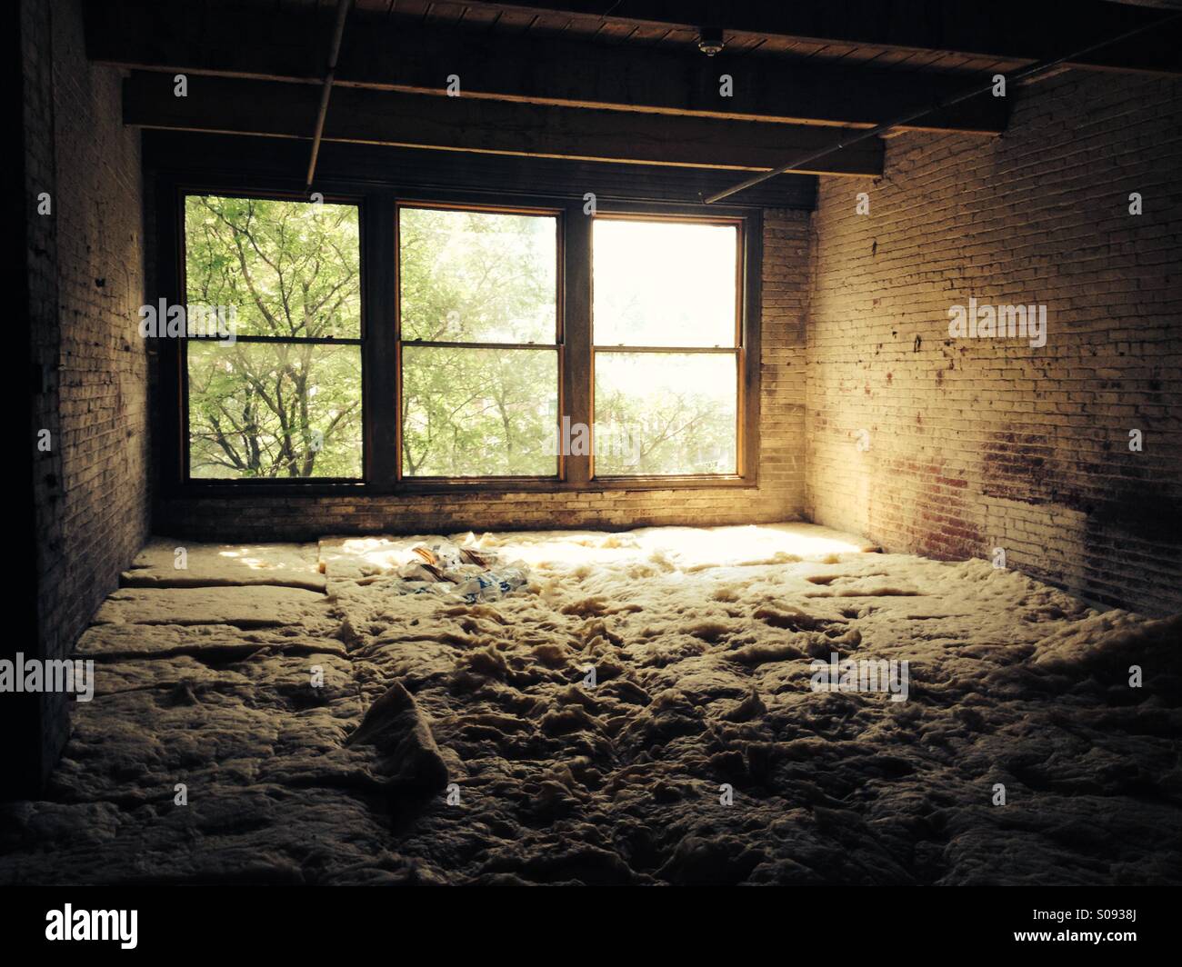 Large window with brick walls installation on the floor Stock Photo - Alamy