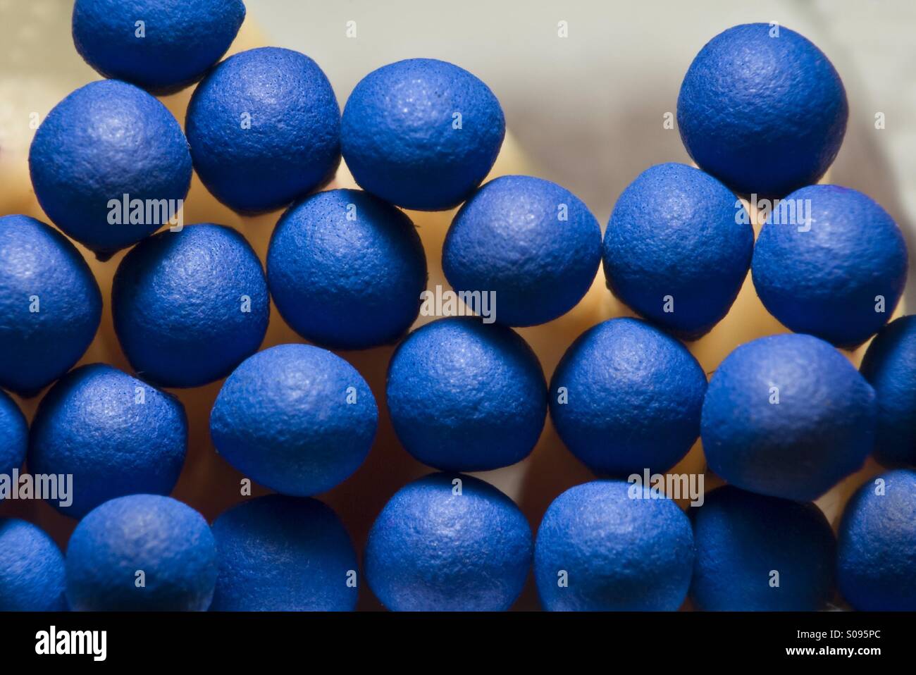 Stack of blue matchsticks Stock Photo - Alamy