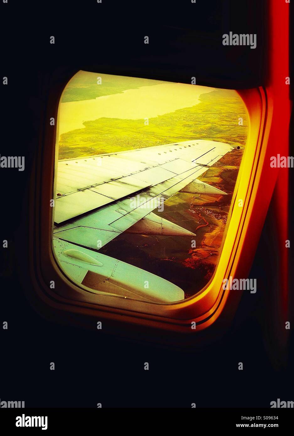 View out an airplane window sun flare hi-res stock photography and ...
