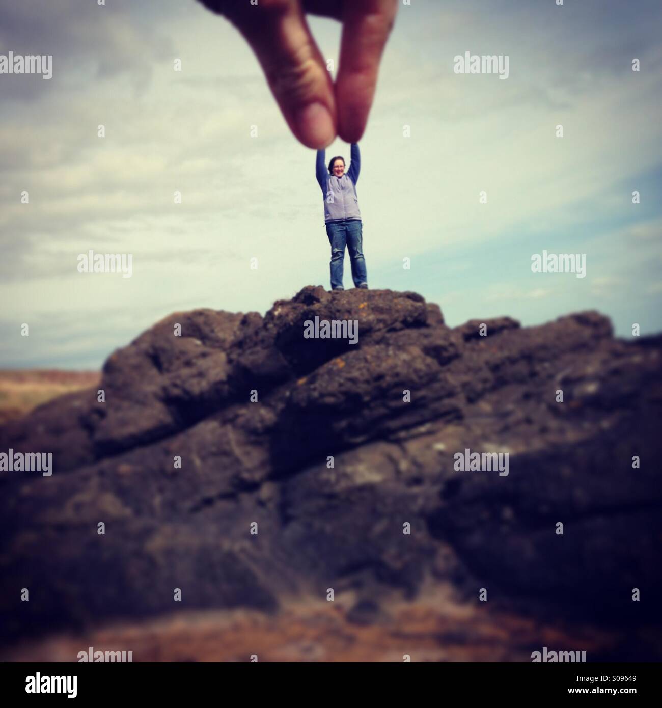 Lifted up by giant Stock Photo - Alamy
