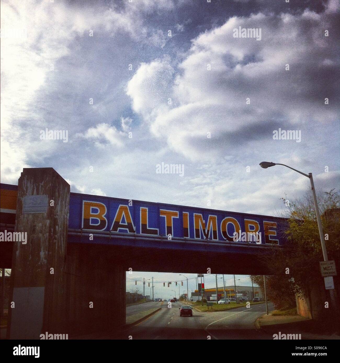 Painted bridge welcoming travelers into Baltimore Stock Photo - Alamy