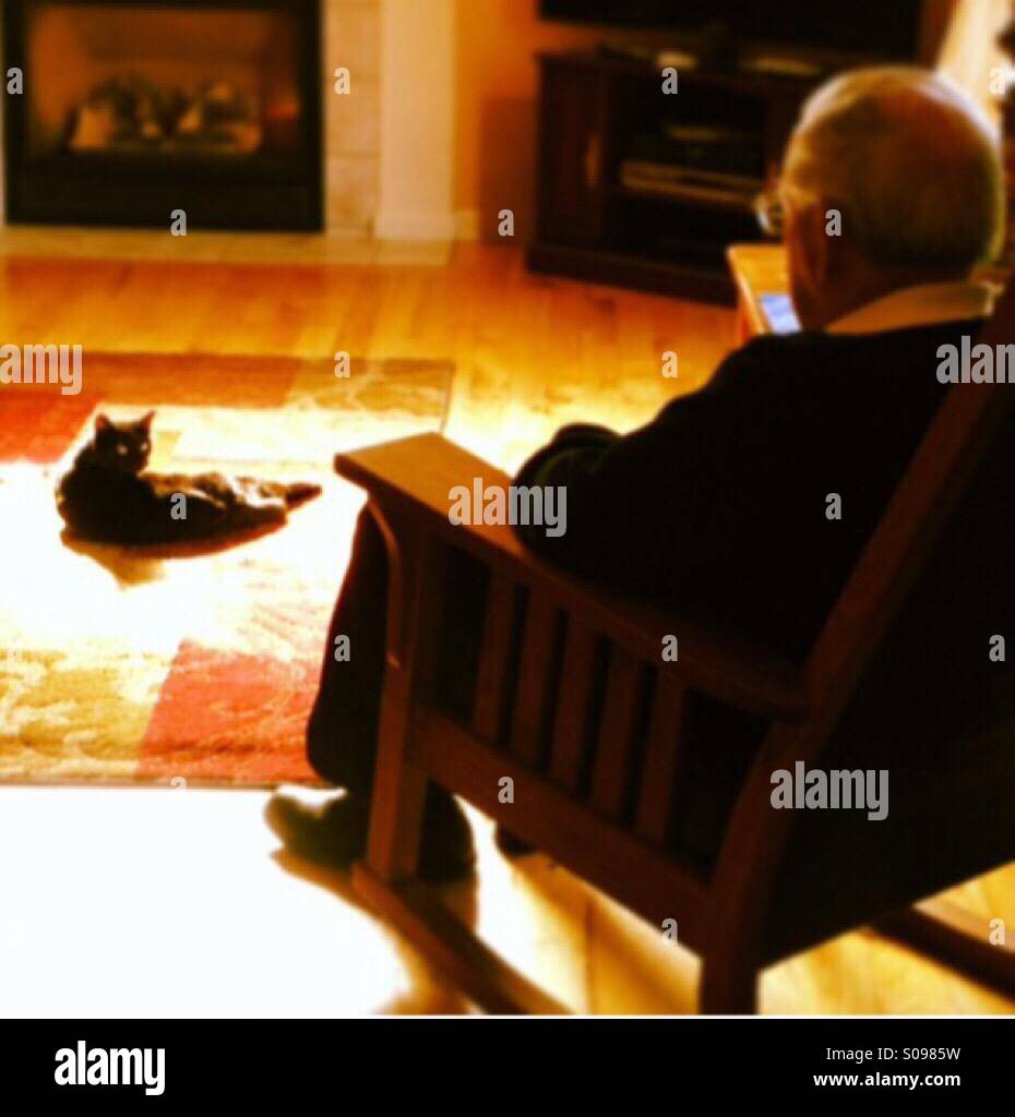 Old man and cat Stock Photo - Alamy
