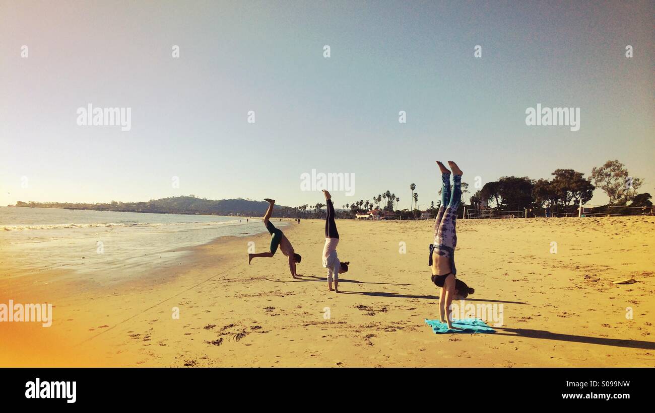 Handstands on the beach Stock Photo - Alamy