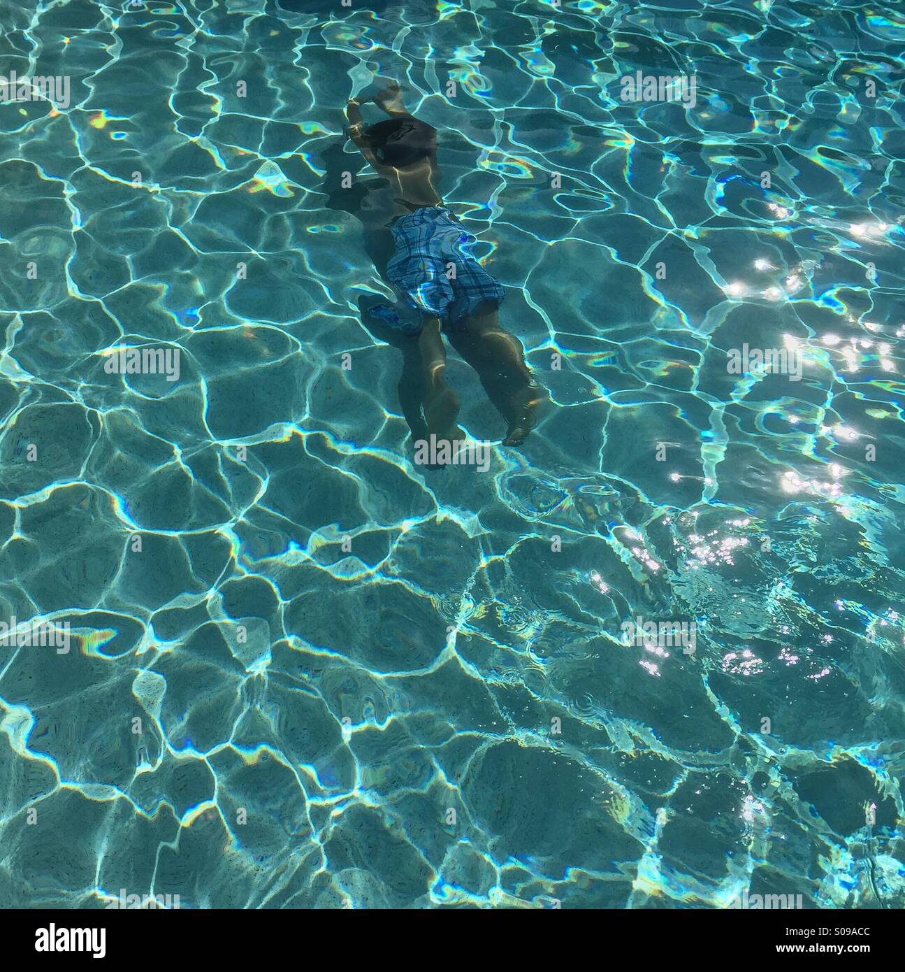 Boy in water Stock Photo - Alamy