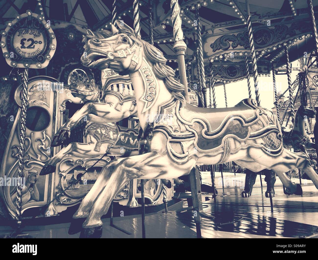 Carousel Horses on a Fairground Merry-Go-Round ride Stock Photo - Alamy