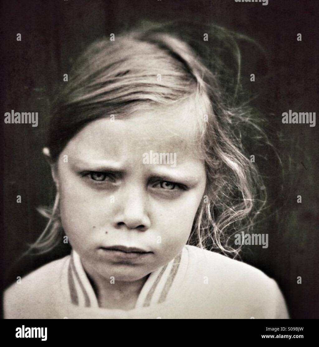 Child looking very cross hi-res stock photography and images - Alamy
