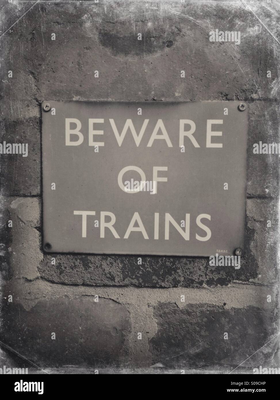 Beware of trains sign Stock Photo - Alamy