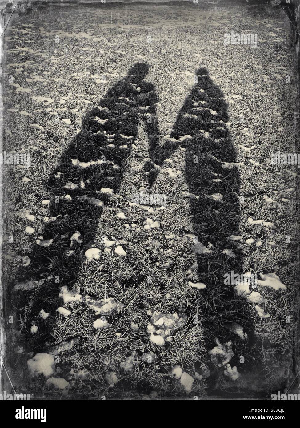 Shadow of people holding hands Stock Photo - Alamy