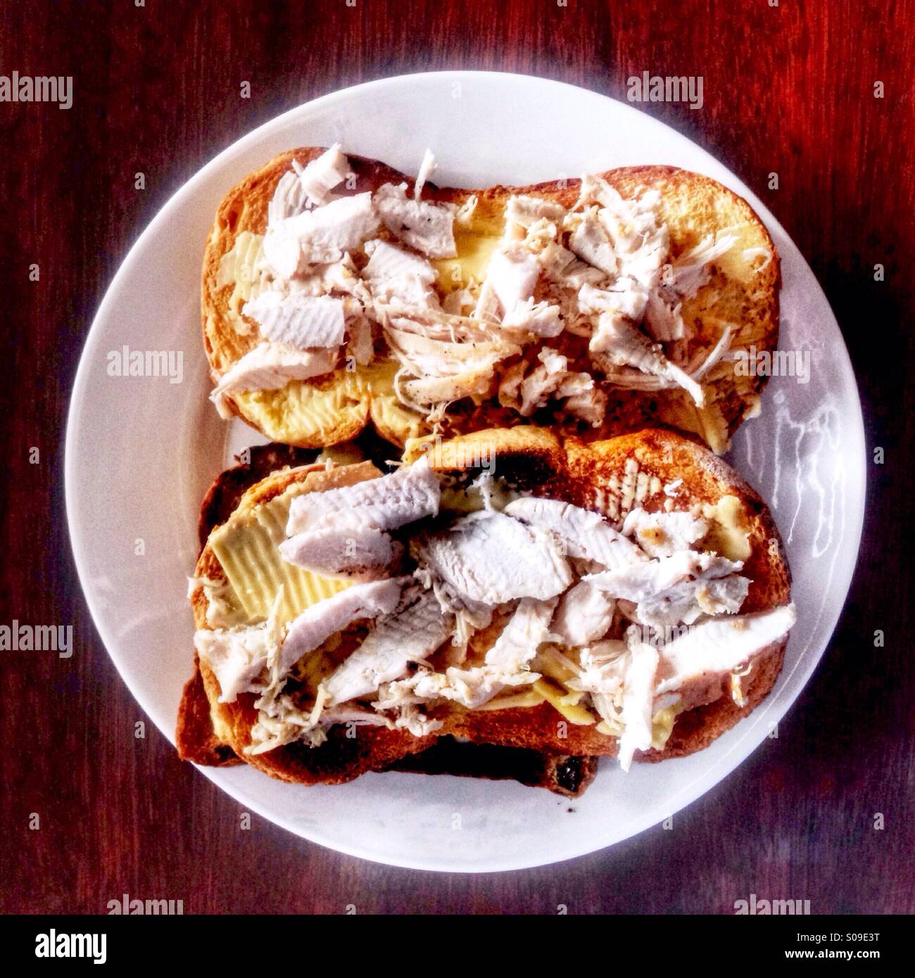 Toast with butter and shredded chicken Stock Photo - Alamy