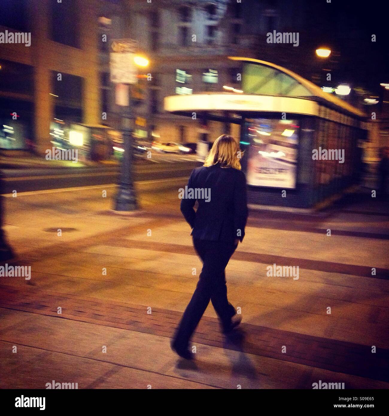 Woman walking night city hi-res stock photography and images - Alamy