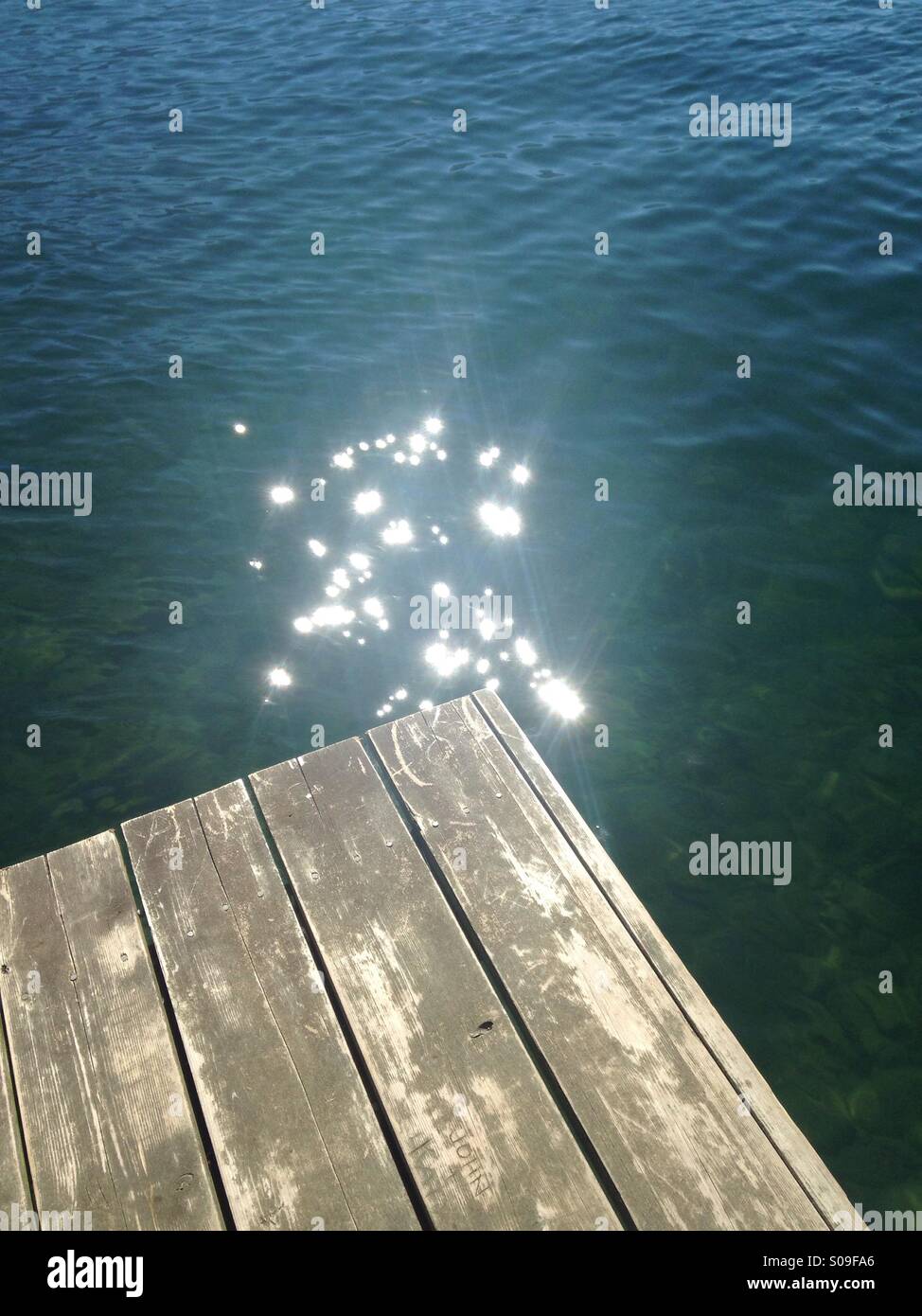 Sun sparkle on the lake Stock Photo - Alamy
