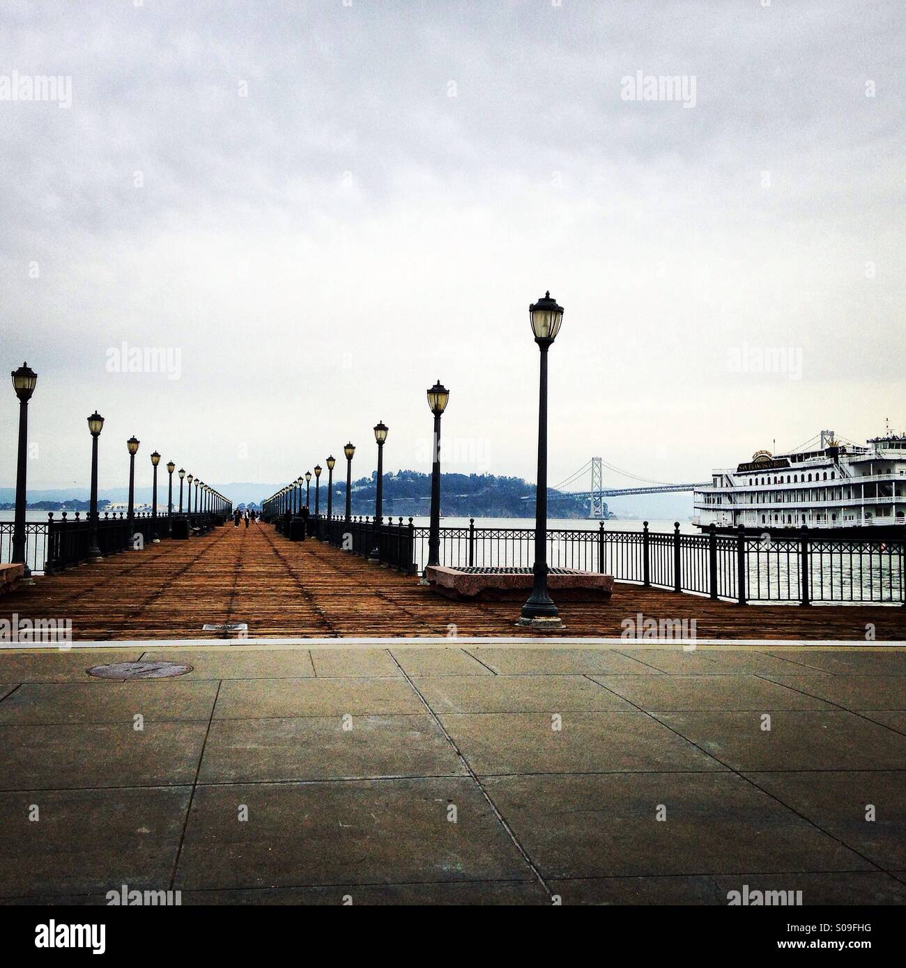 Lamp post lined pier - San Francisco Stock Photo - Alamy