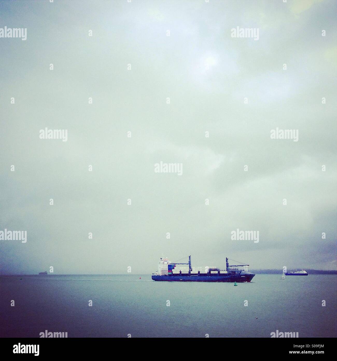 Ship coming into Portsmouth harbour Stock Photo - Alamy