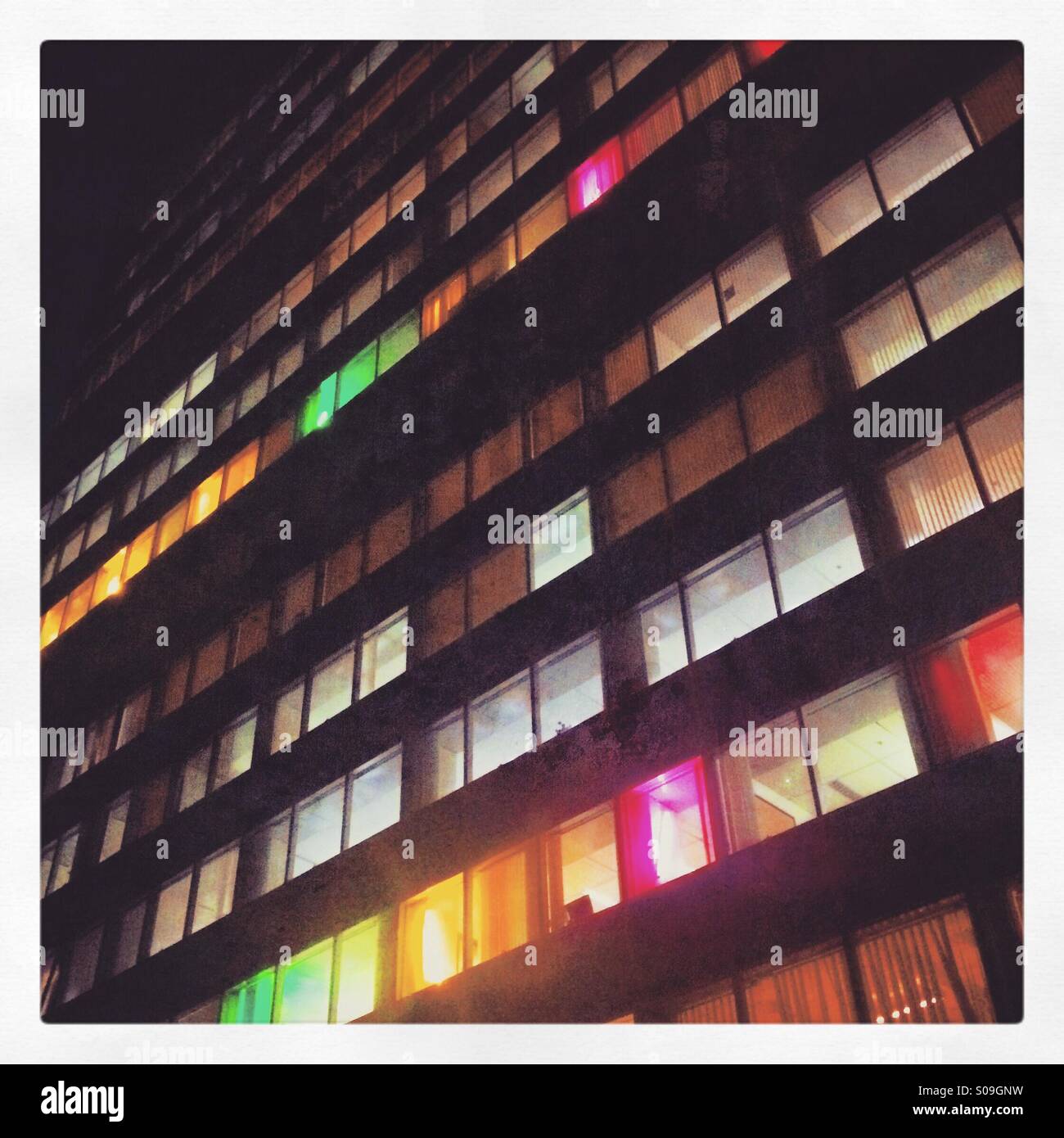 Coloured lights in the windows of a building in Old Street, London ...