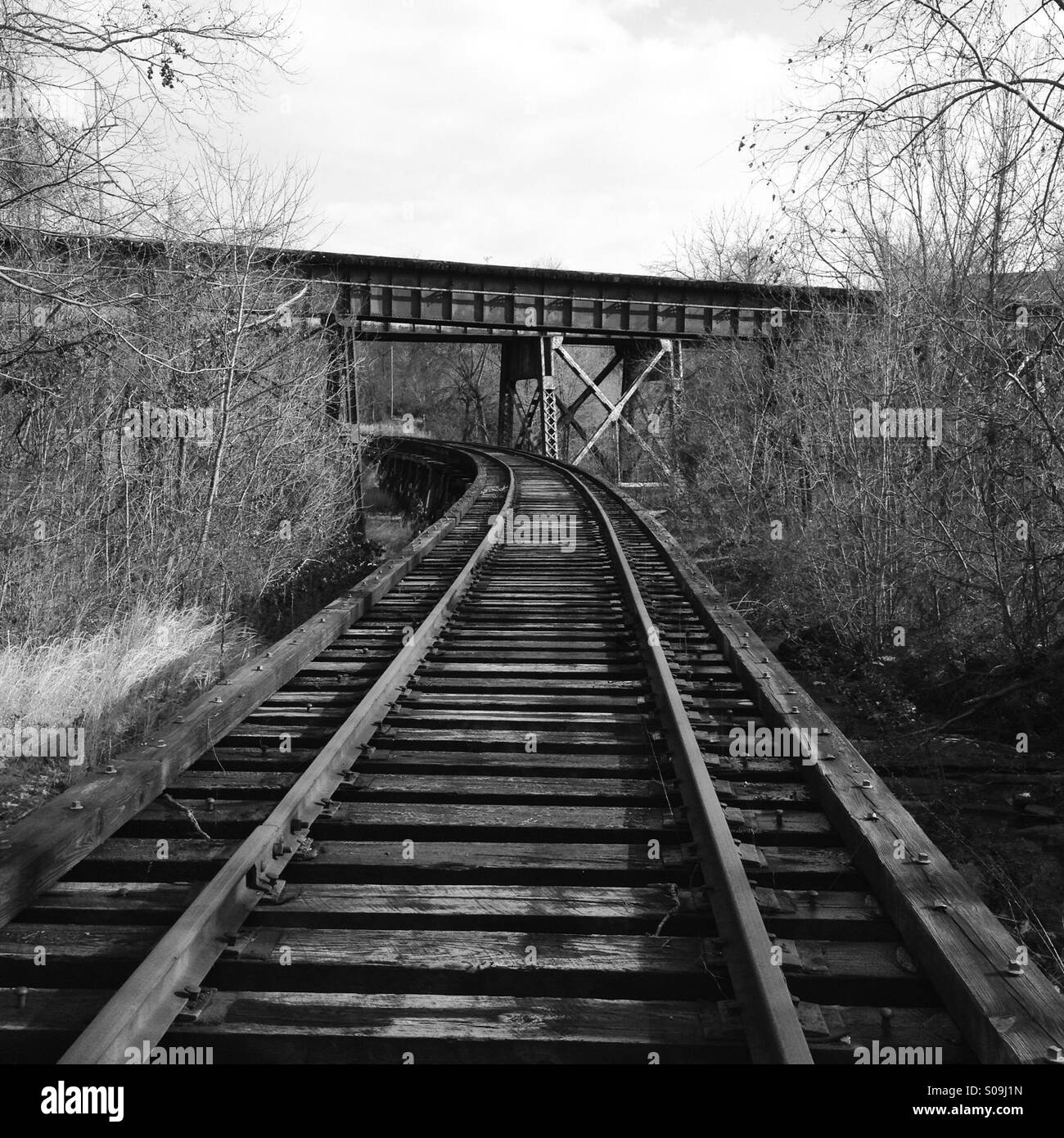Railroad tracks and train trestle Stock Photo - Alamy