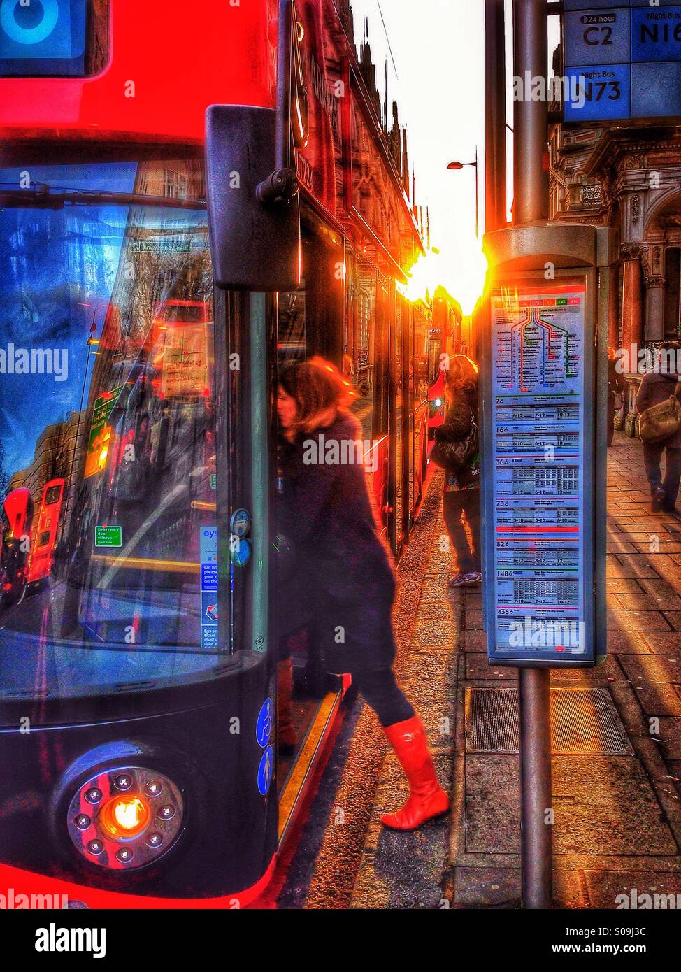 Catching the bus Stock Photo - Alamy