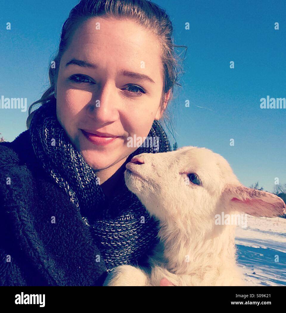 Female holding lamb hi-res stock photography and images - Alamy