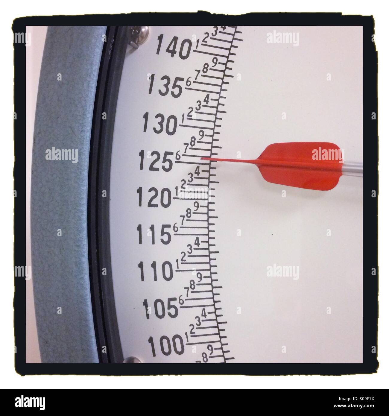 A scale reads 126 pounds Stock Photo - Alamy