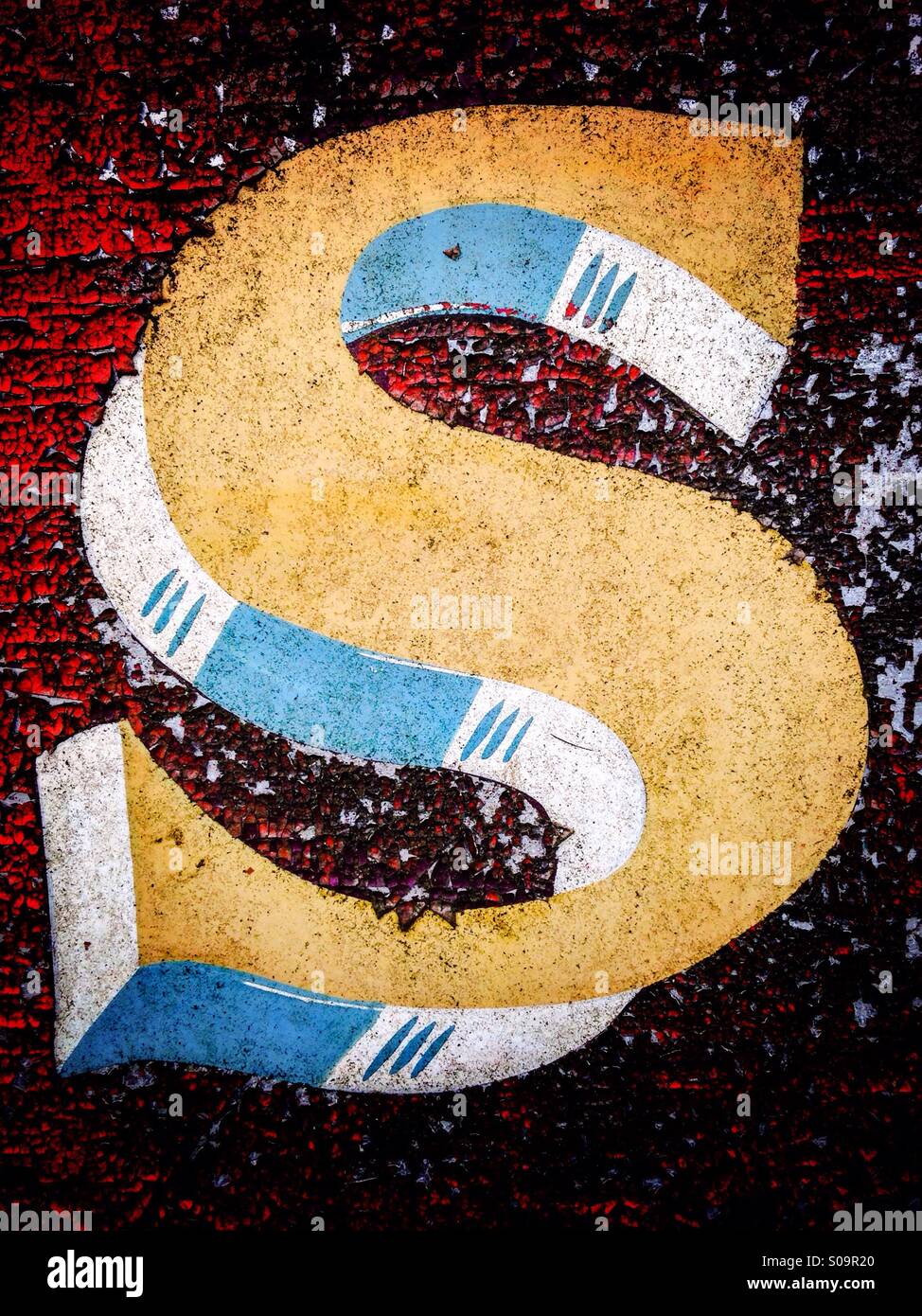 A flakey peeling painted letter s Stock Photo - Alamy