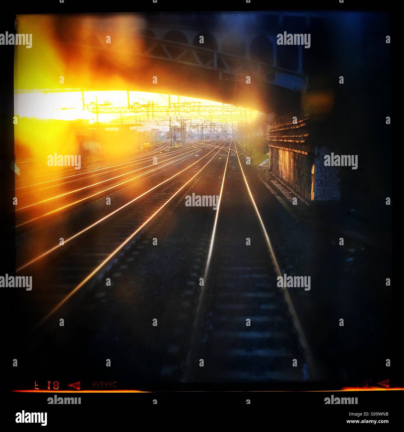 Train railway in the sunset Stock Photo - Alamy
