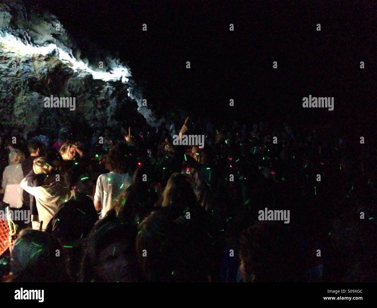 New Years beach cave party Stock Photo - Alamy