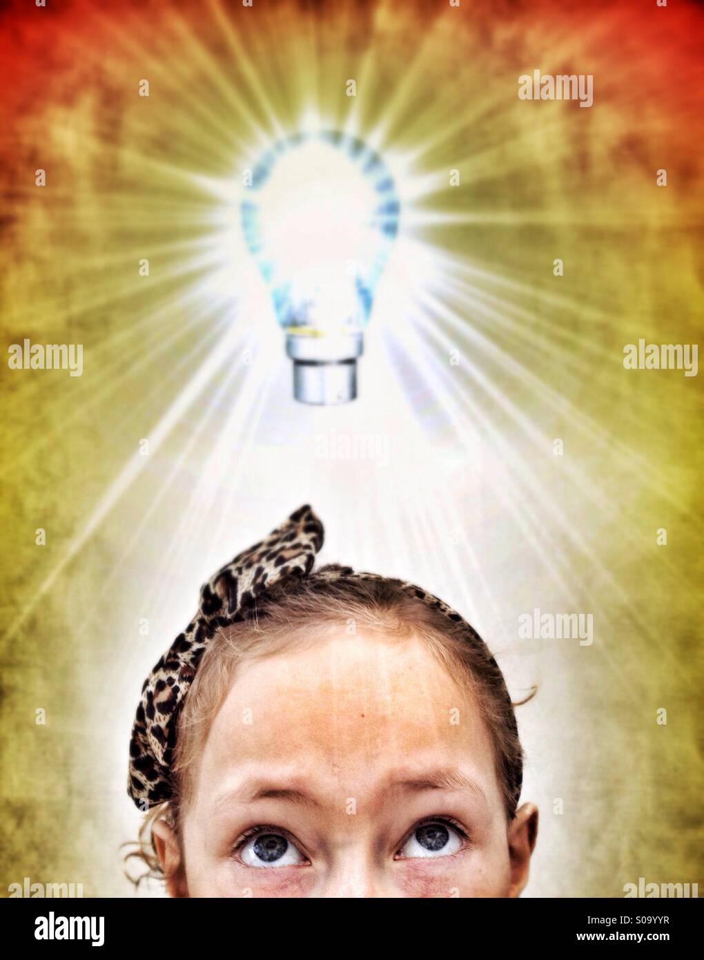 Young girl with light bulb above her head Stock Photo - Alamy