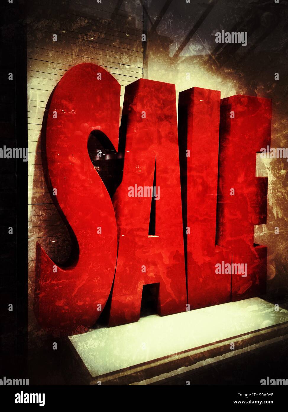 Sale sign in a window Stock Photo - Alamy