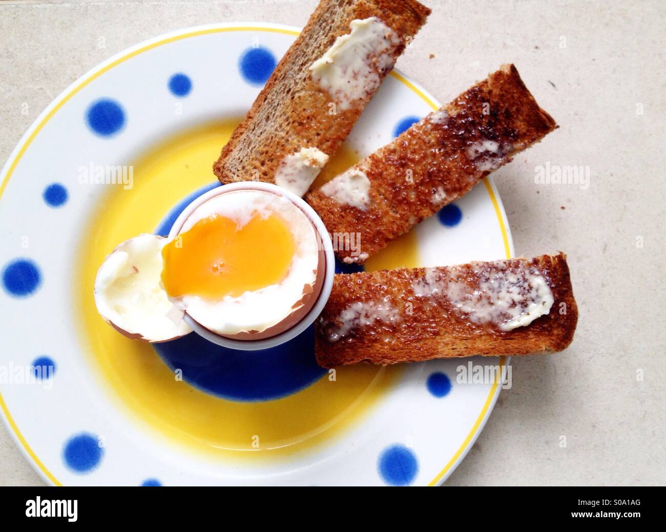 Soft boiled egg with toast soldiers Stock Photo - Alamy