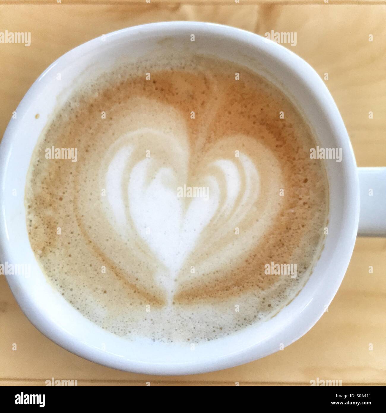 Coffee with heart shape Stock Photo - Alamy