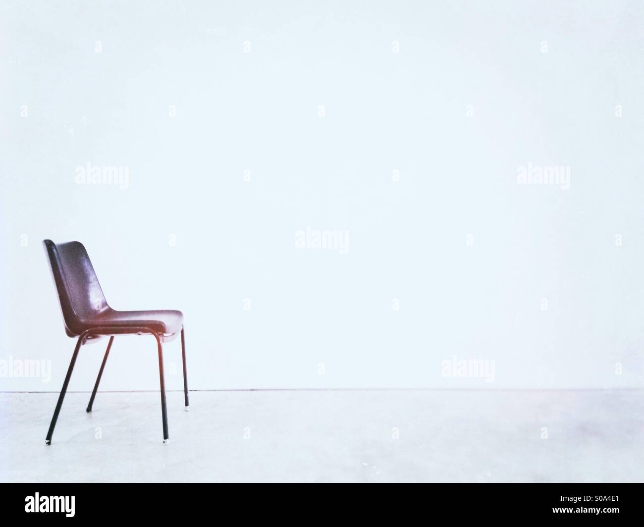 Lonely chair hi-res stock photography and images - Alamy