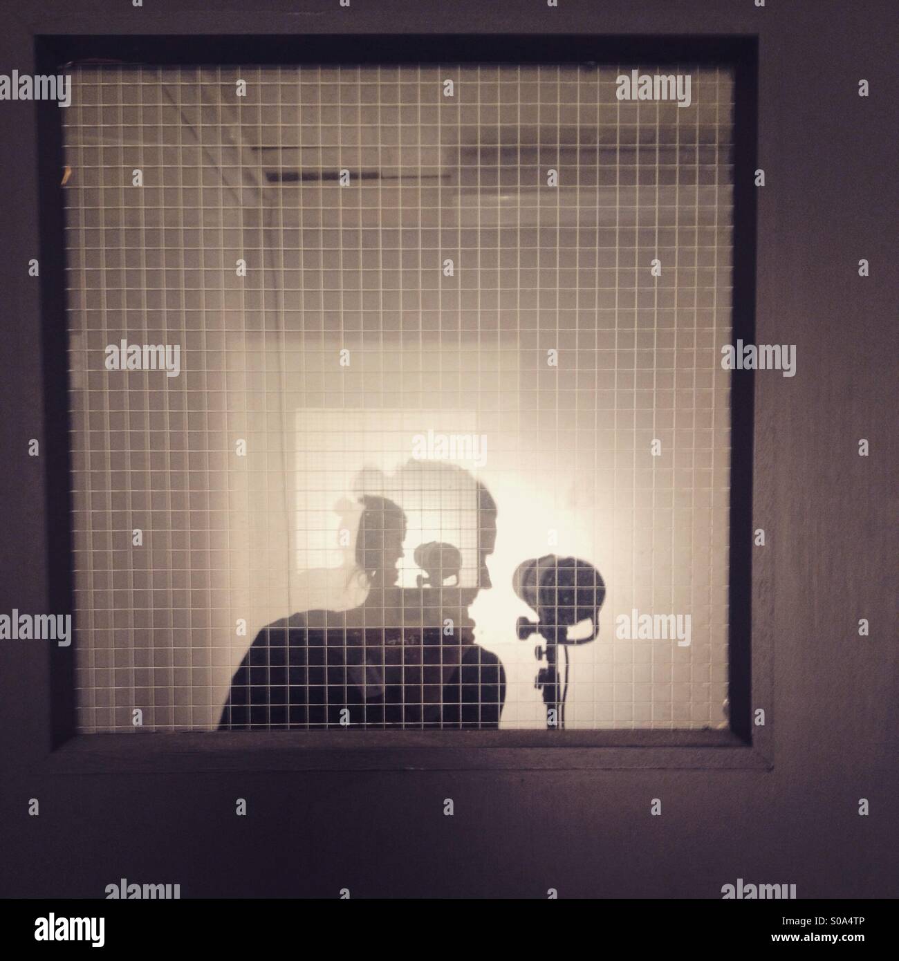 Double woman window hi-res stock photography and images - Alamy