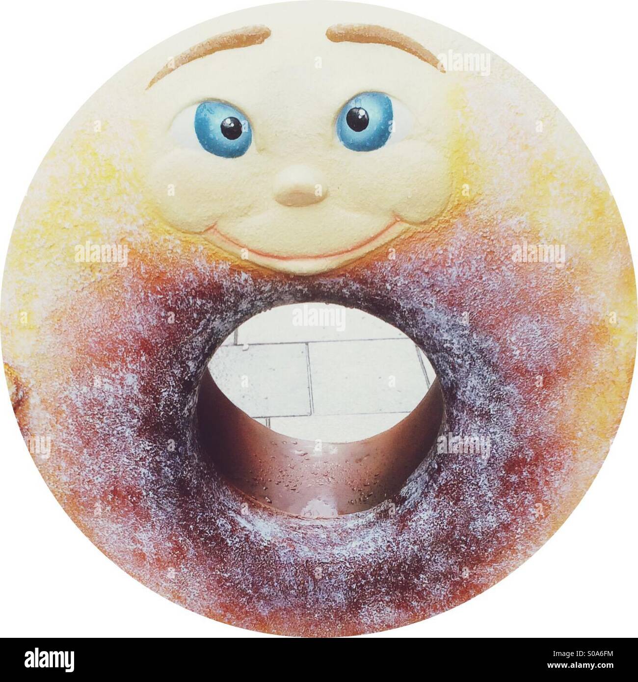 Happy smiley round character with a hole on the center Stock Photo - Alamy