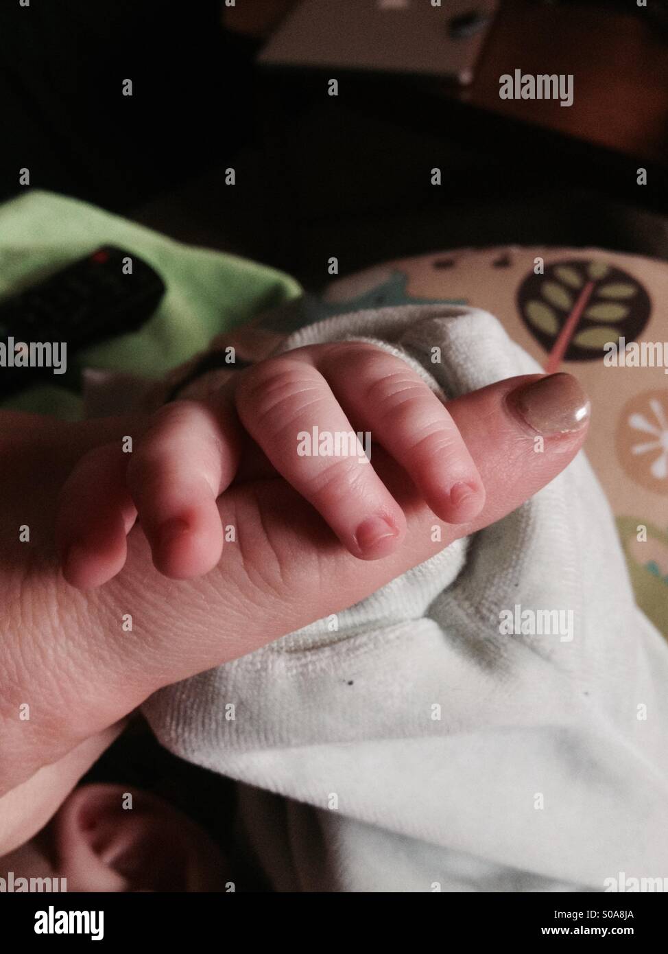 Baby hand hi-res stock photography and images - Alamy