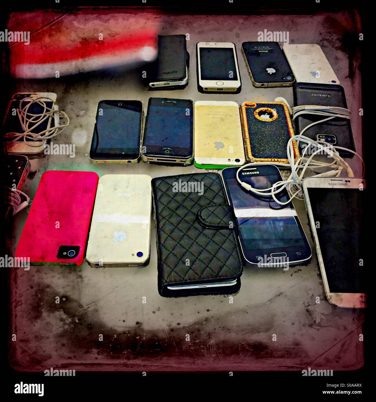 mobile phones on a table Stock Photo - Alamy