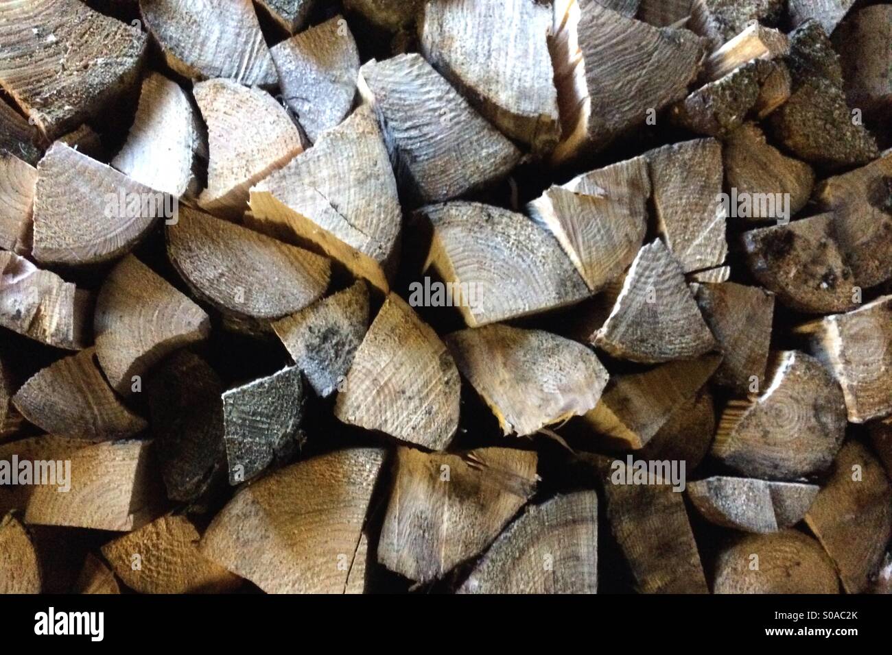 Firewood stack ready for the snow Stock Photo - Alamy