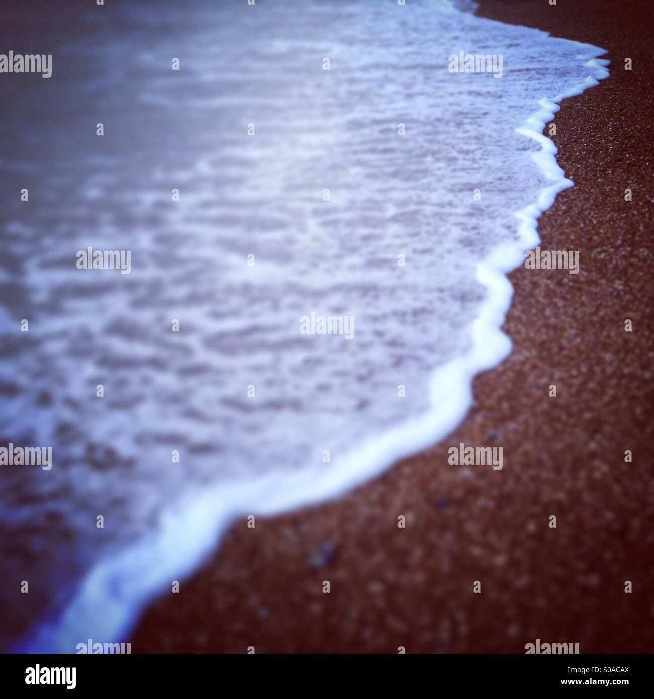 Wave pebbles hi-res stock photography and images - Alamy