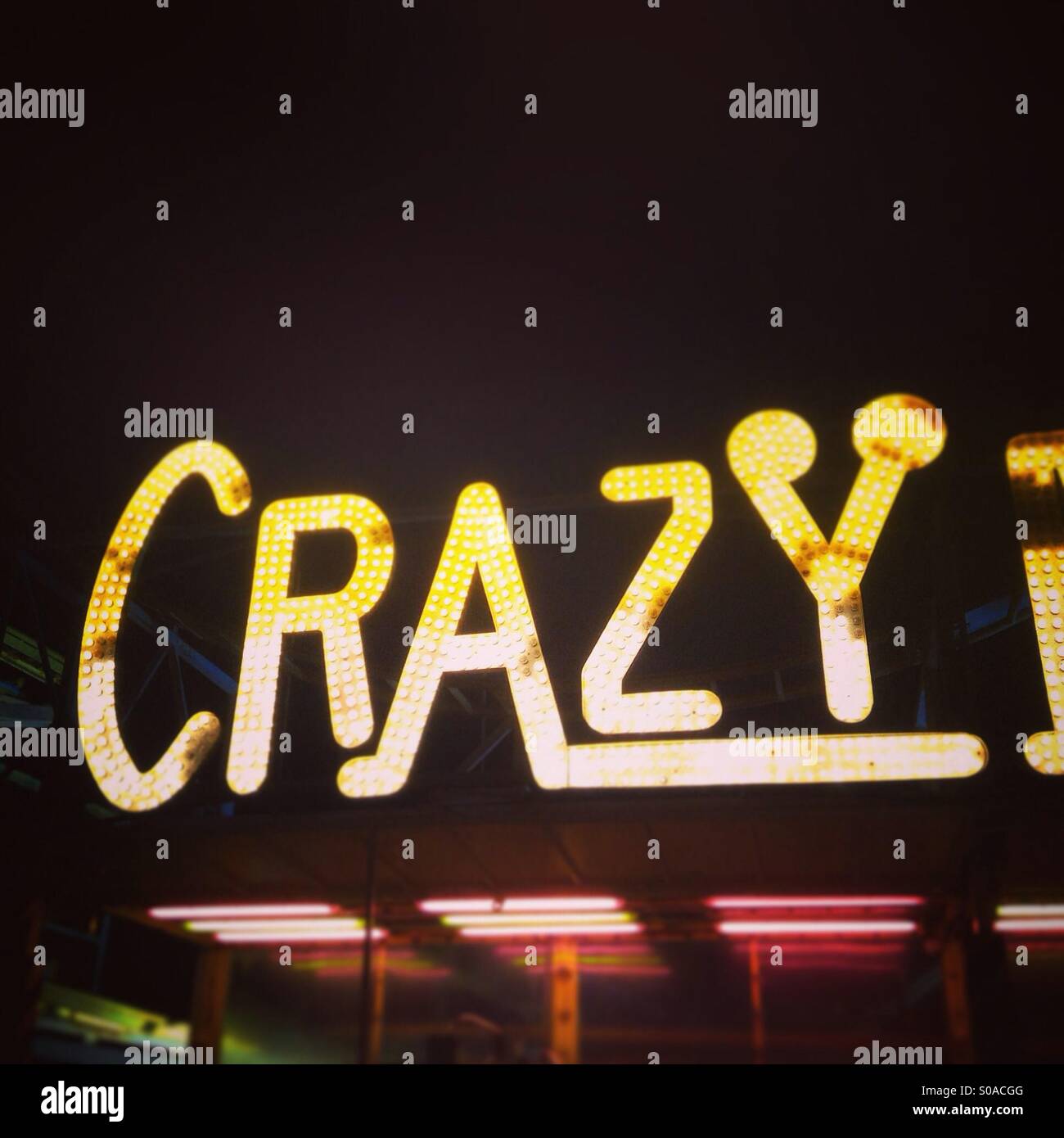 Electric crazy sign white and yellow Stock Photo - Alamy