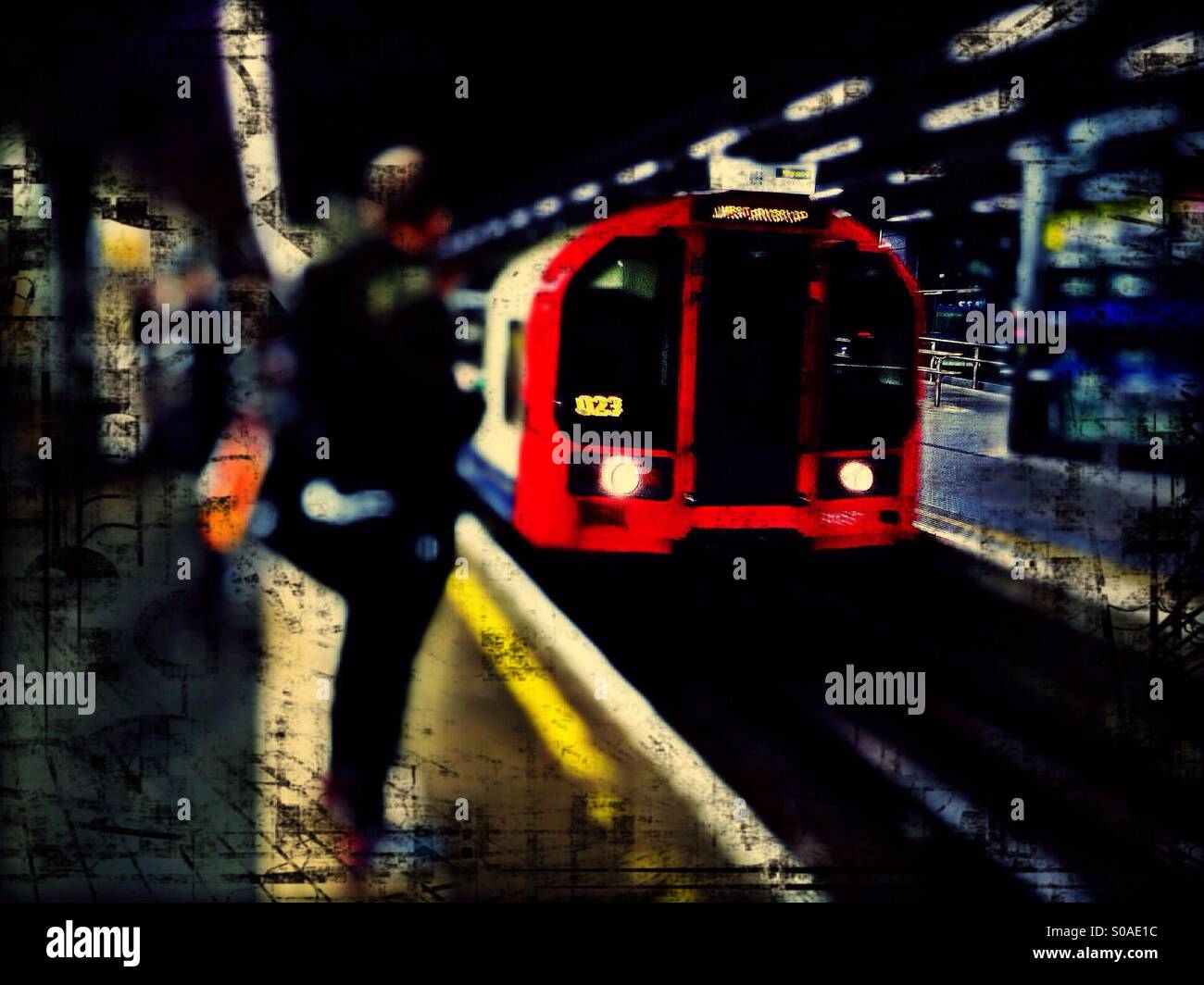Central Line Tube train arriving at platform. Stratford, East London ...