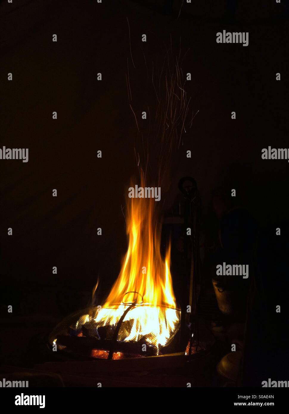 Warm winter fire Stock Photo - Alamy