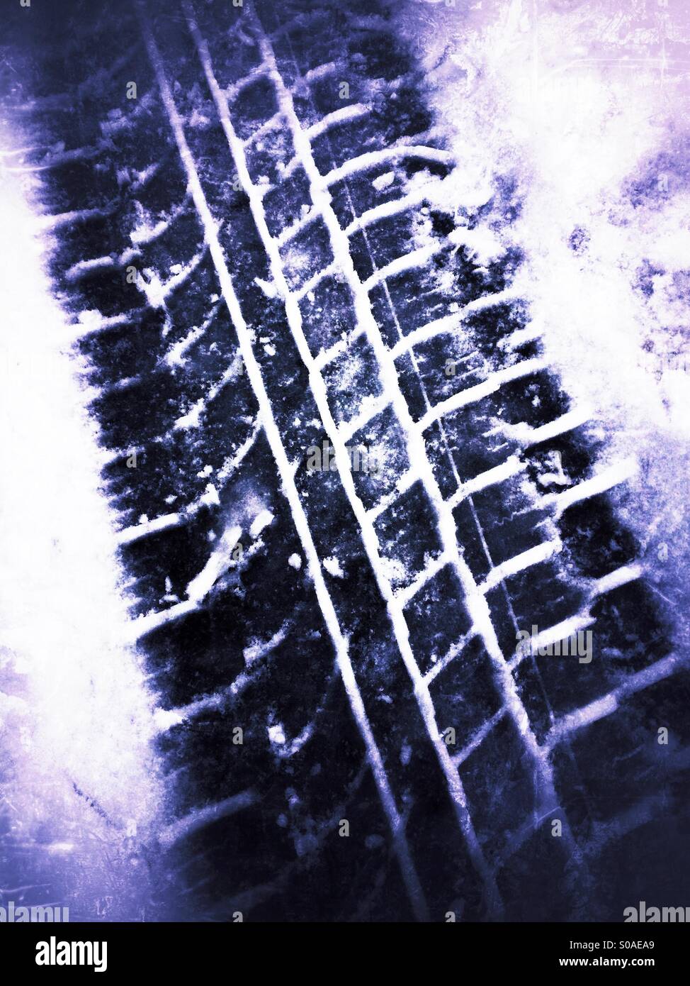 Tyre track in the snow Stock Photo - Alamy
