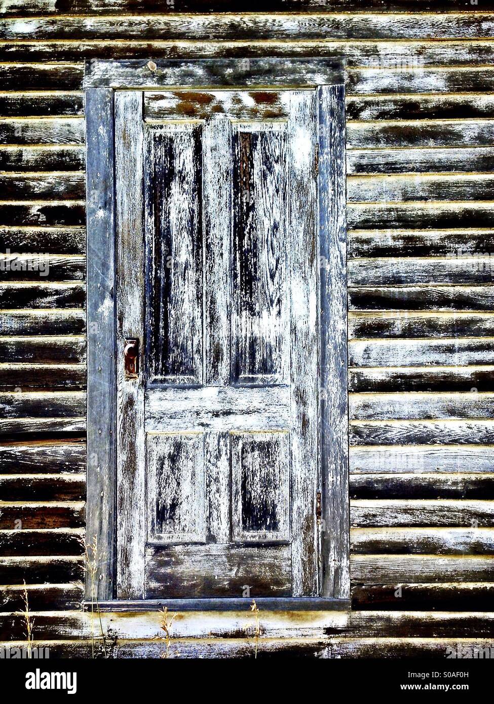 Raised doorway into an abandoned house in the ghost town of Orion, in ...