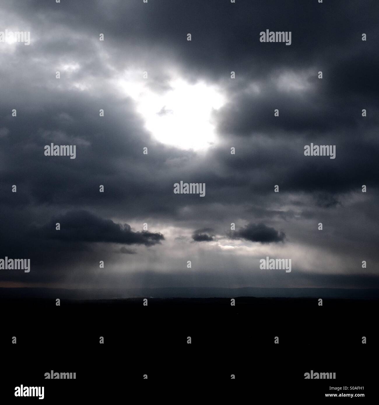 Stormy sun beams Stock Photo - Alamy