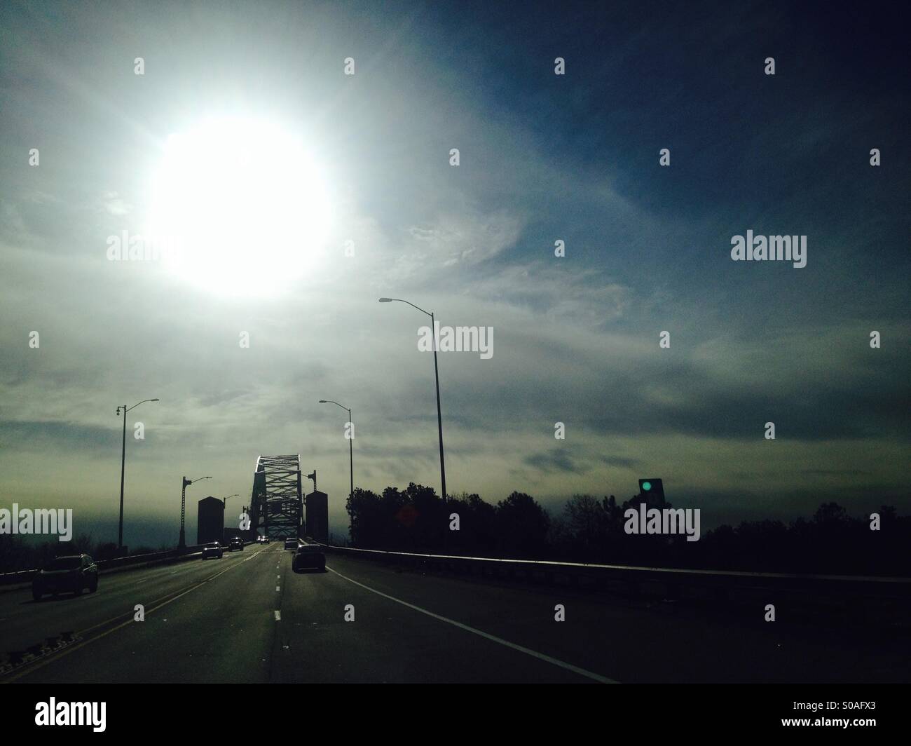 Sun over bridge hi-res stock photography and images - Alamy