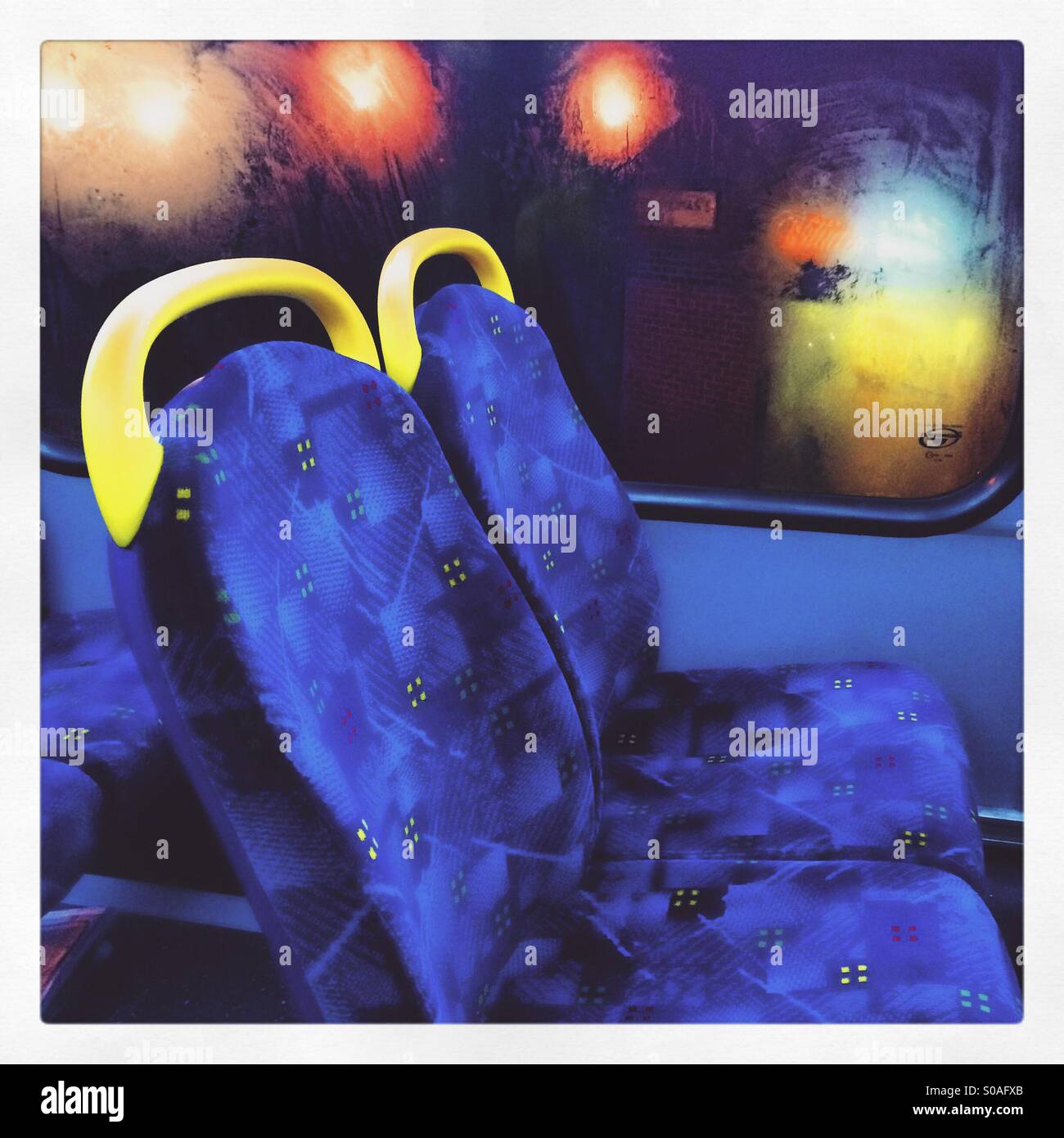 Empty seats on a London bus Stock Photo - Alamy