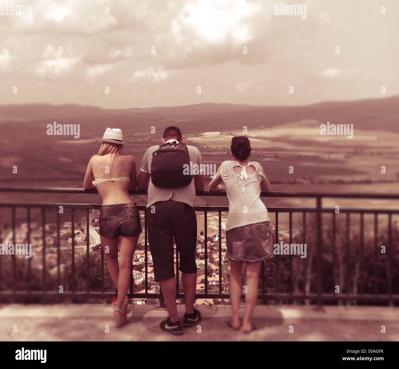 Friends admiring a beautiful view Stock Photo - Alamy