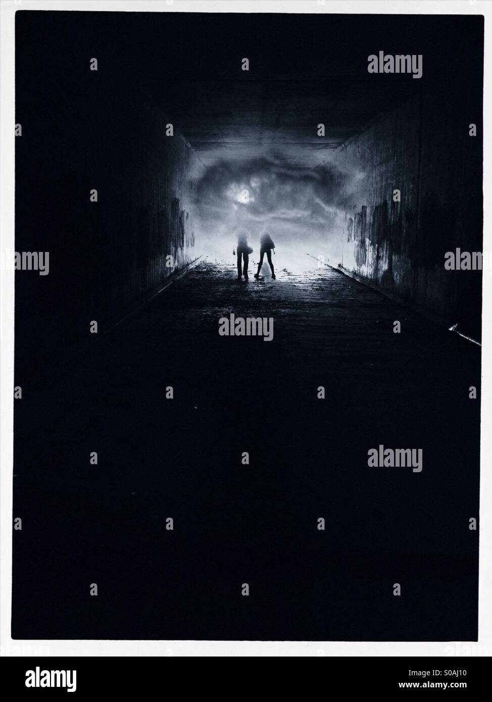 Smoke effect at end of tunnel Stock Photo - Alamy